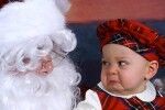 13 Awkward Santa Photos